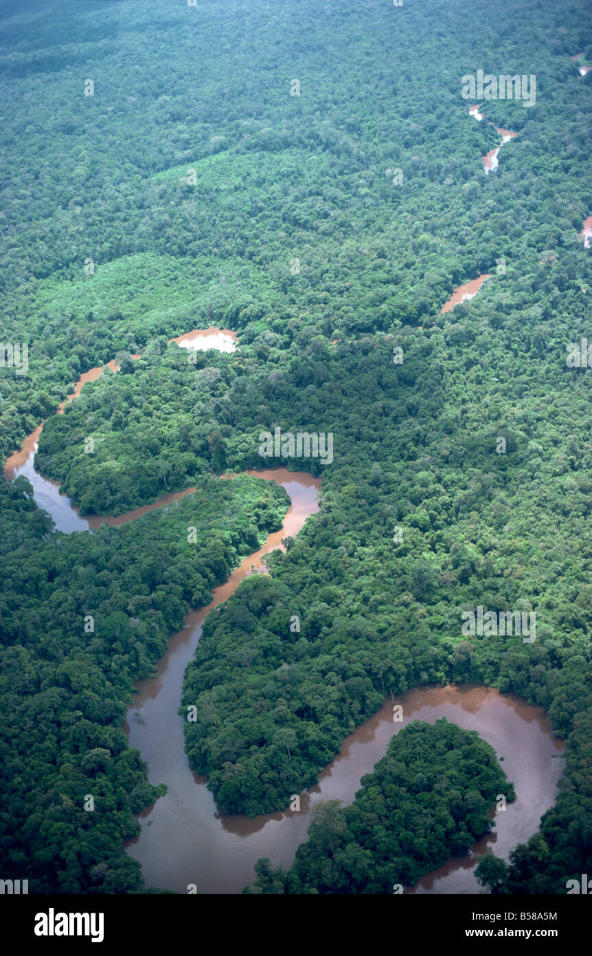 Aerial view of the meandering Belait River, Brunei, island of Borneo ...