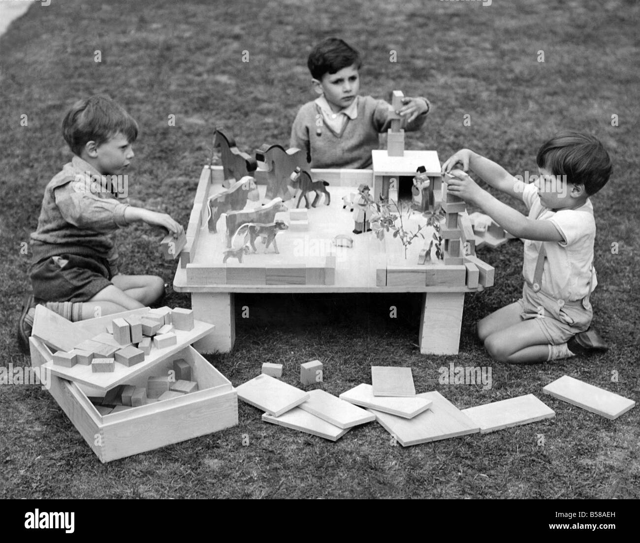 1930s children playing with toys Black and White Stock Photos & Images ...