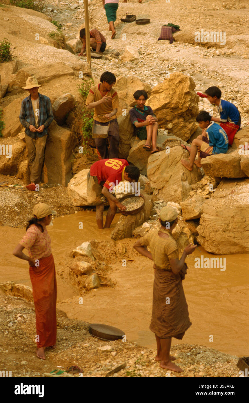 Children sieving and washing small gems from stream below mine Mogok ...