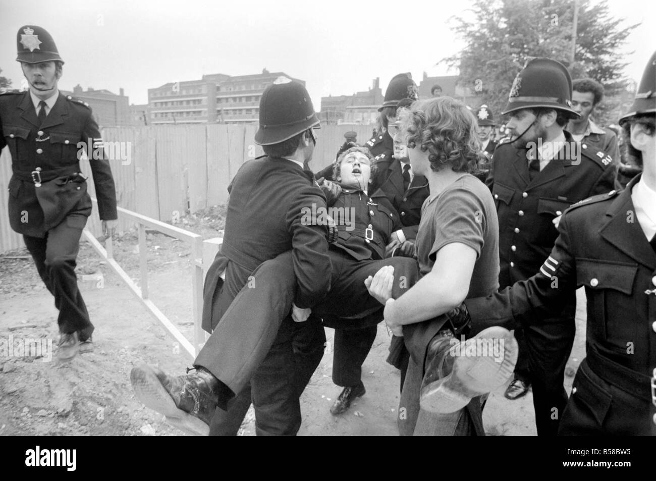 Lewisham Riot 1977: An injured policeman is carried away from the ...