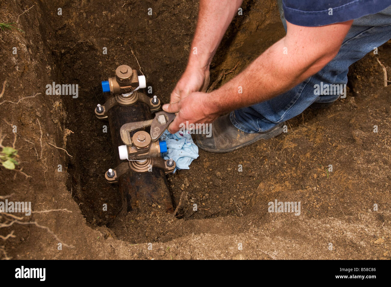 Tapping water pipes hi-res stock photography and images - Alamy