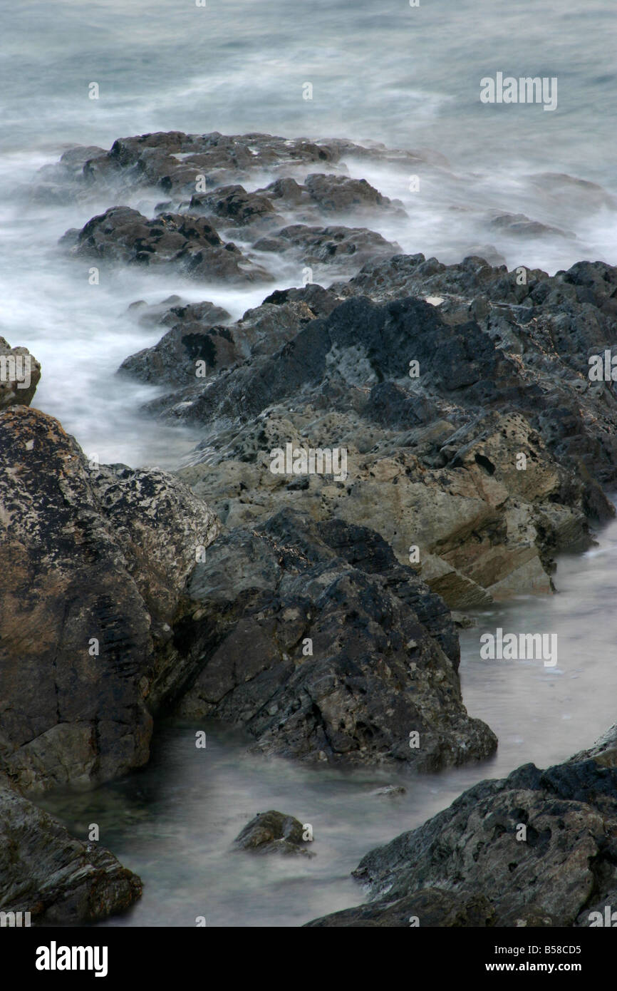 Interesting water over rocks Stock Photo - Alamy