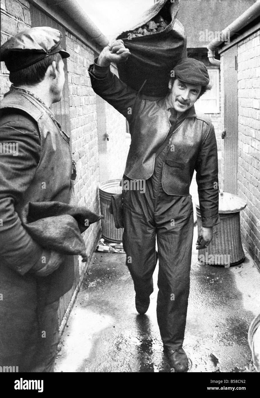 A coalman delivering coal Stock Photo - Alamy