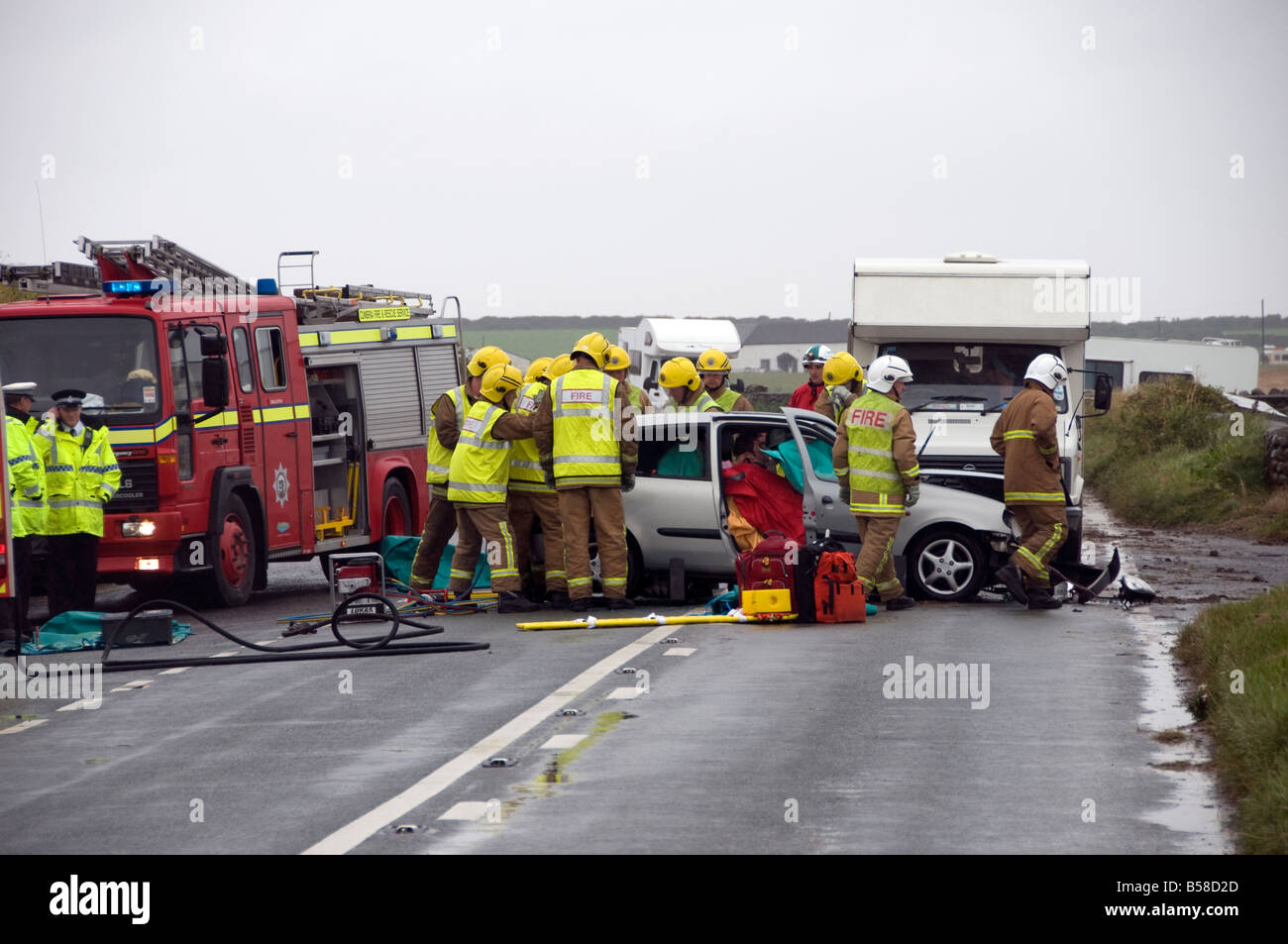 firemen and medics attend rtc in Cumbria Stock Photo - Alamy