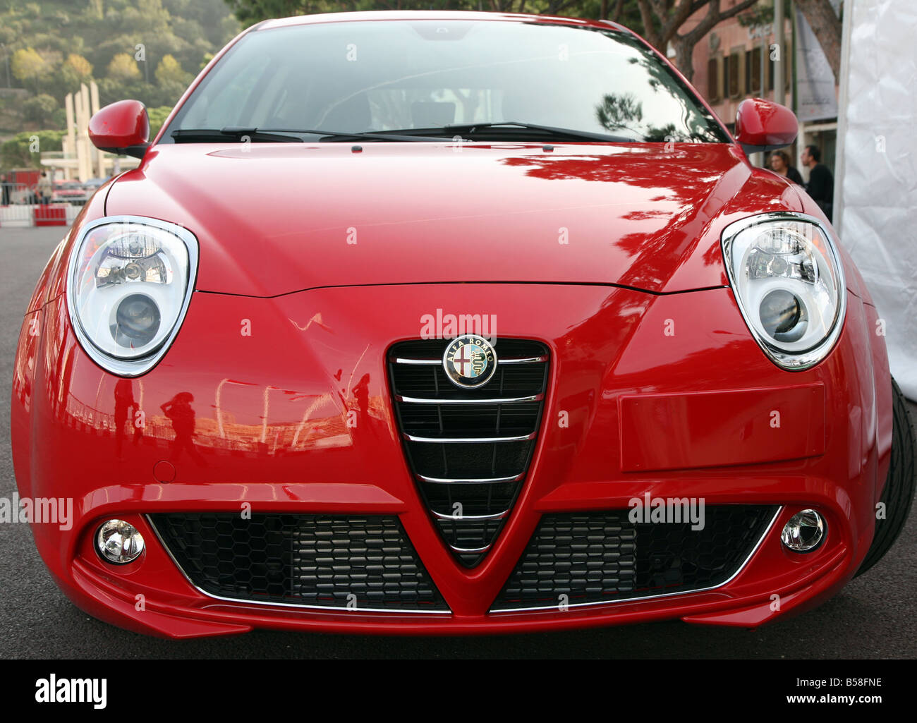 Front view of red Alfa Romeo MiTo compact car with badge visible ...