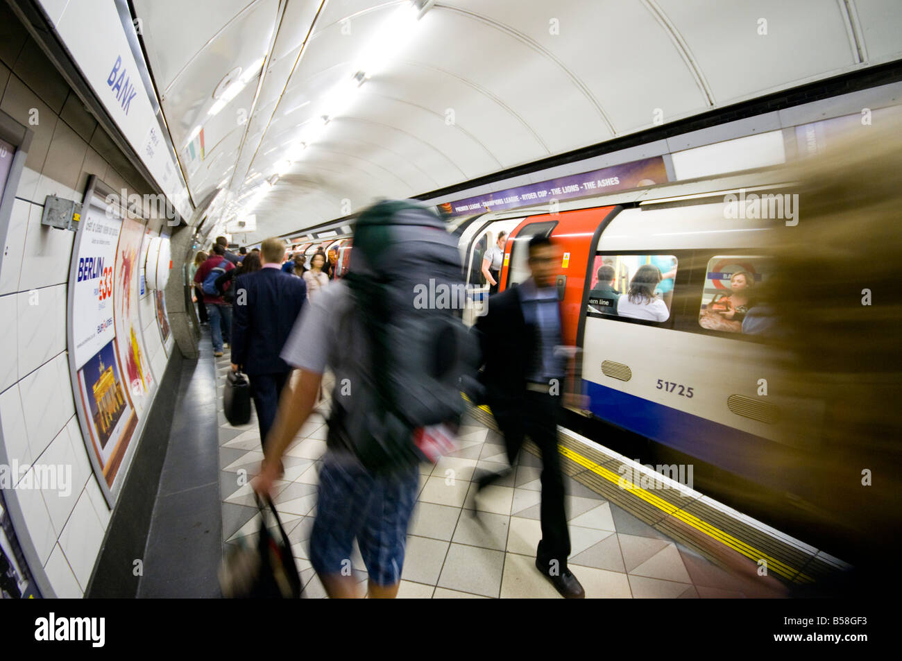 Crowded underground train woman london hi-res stock photography and ...