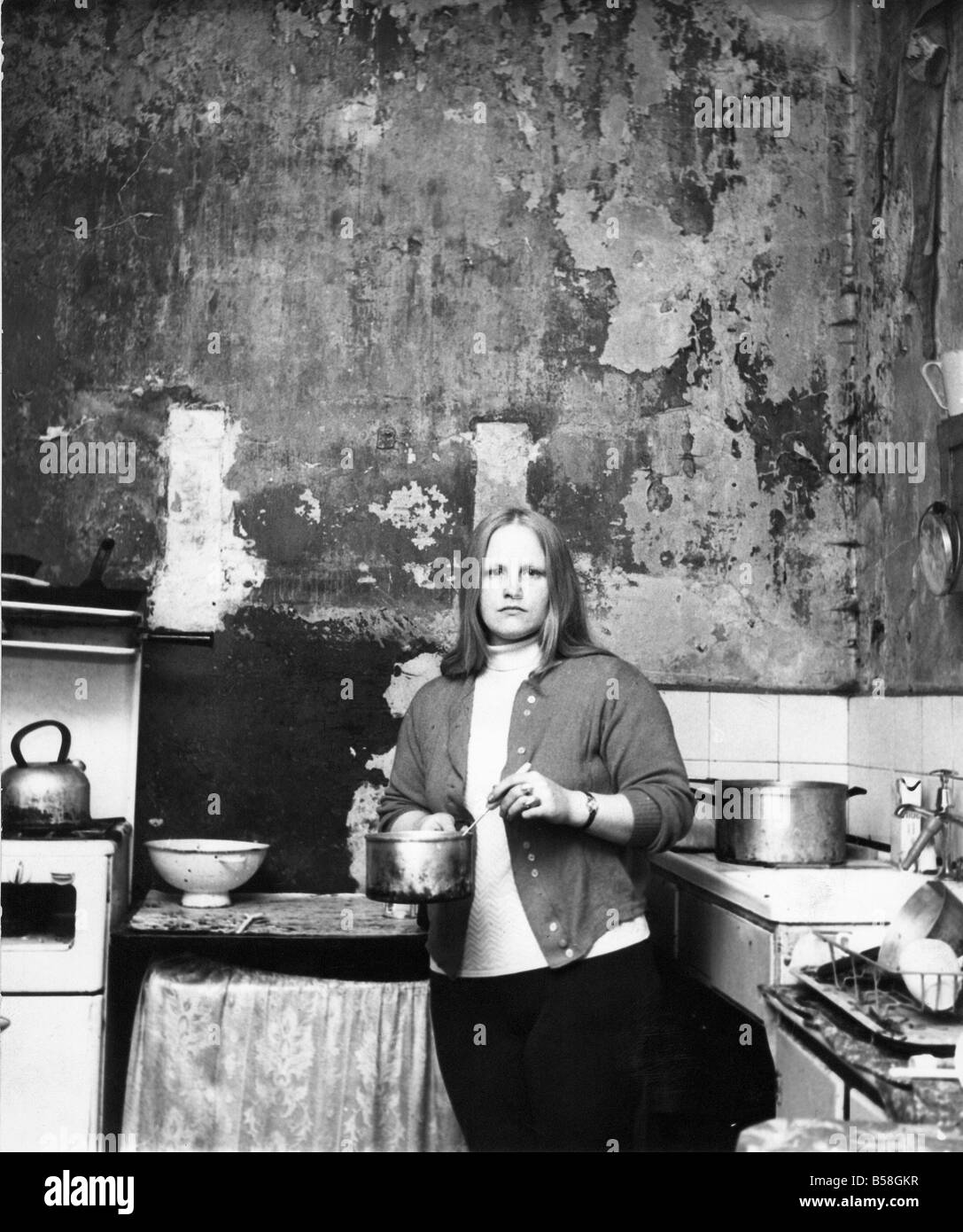 The Interior of slum housing in an area of Newcastle Mrs Campbel in her ...