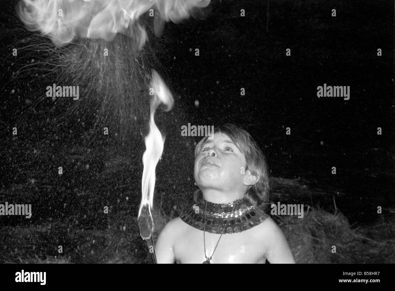 Unusual: Children. Fire Eater. 9 year old Tony Walls. Tony spitting a ...
