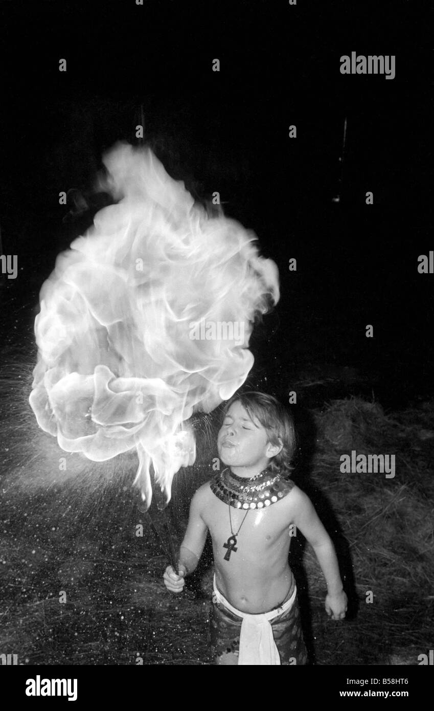 Unusual: Children. Fire Eater. 9 year old Tony Walls. Tony spitting a ...