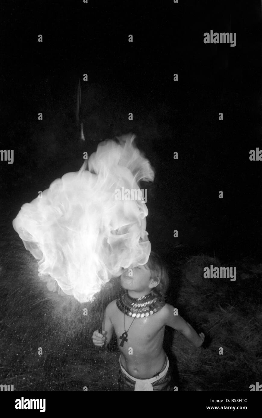 Unusual: Children. Fire Eater. 9 year old Tony Walls. Tony spitting a ...