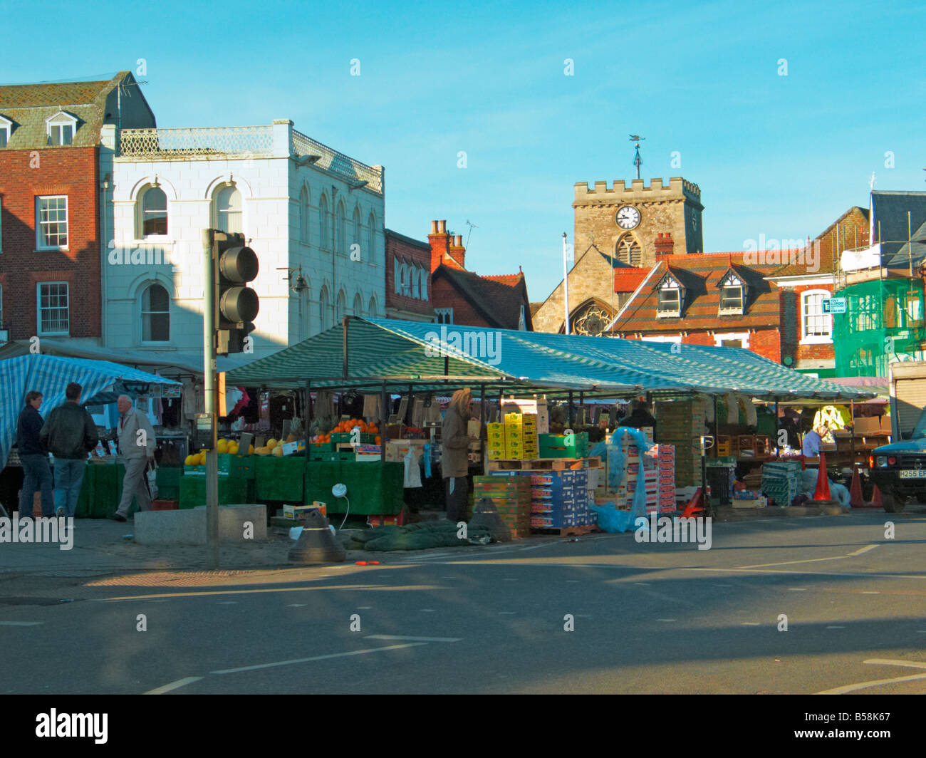 Surrounded by Church and commercial buildings, the open air farmers ...