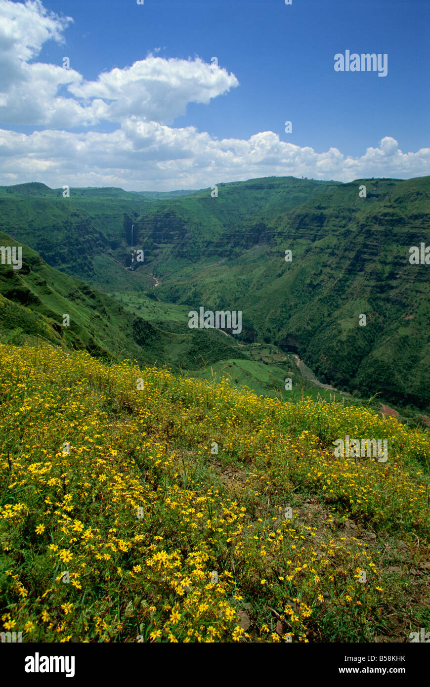 Waterfall cascades down lush valley, Mulu Gorge, near Addis Ababa ...