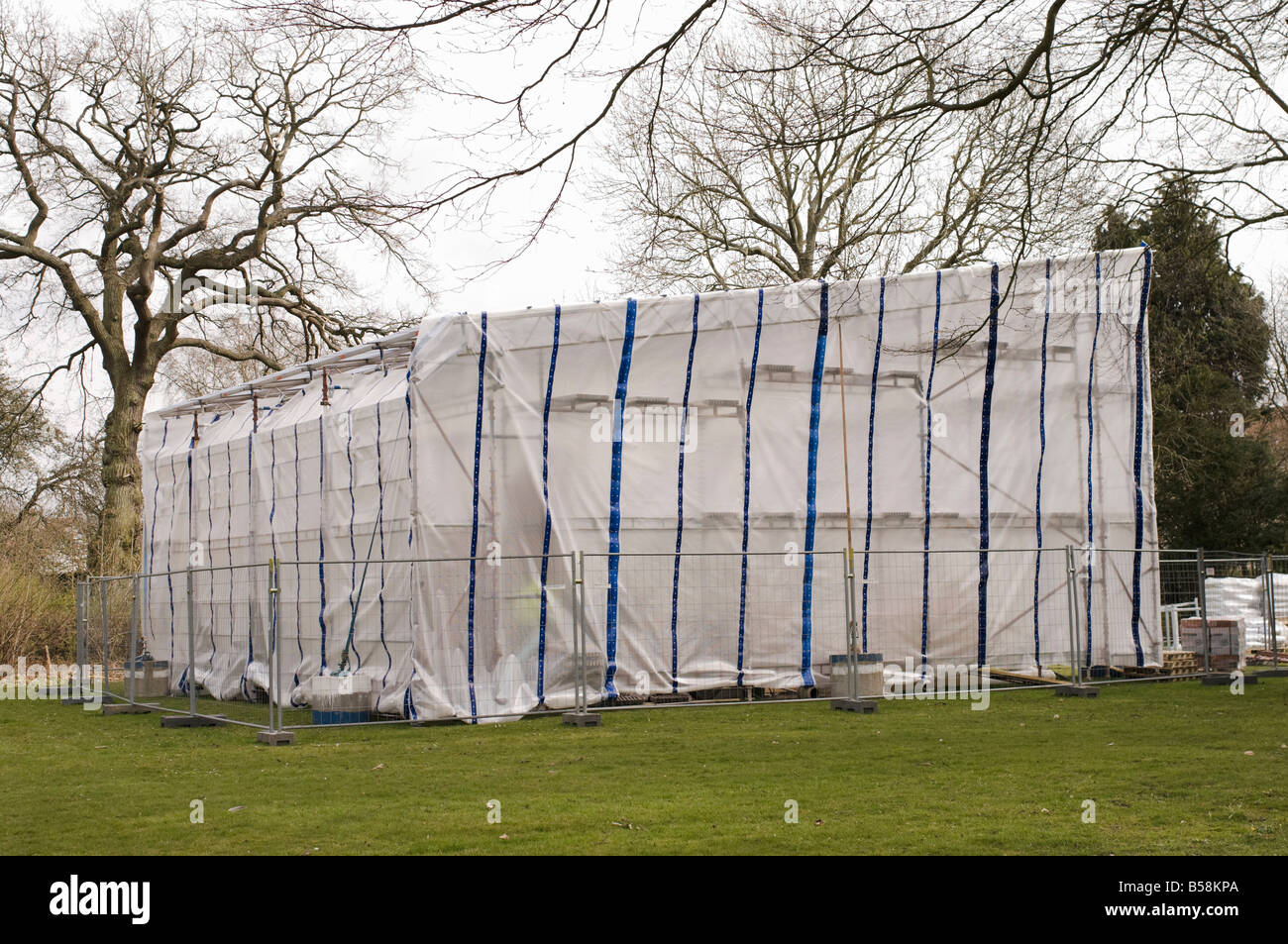Construction site protected by a tent Stock Photo - Alamy