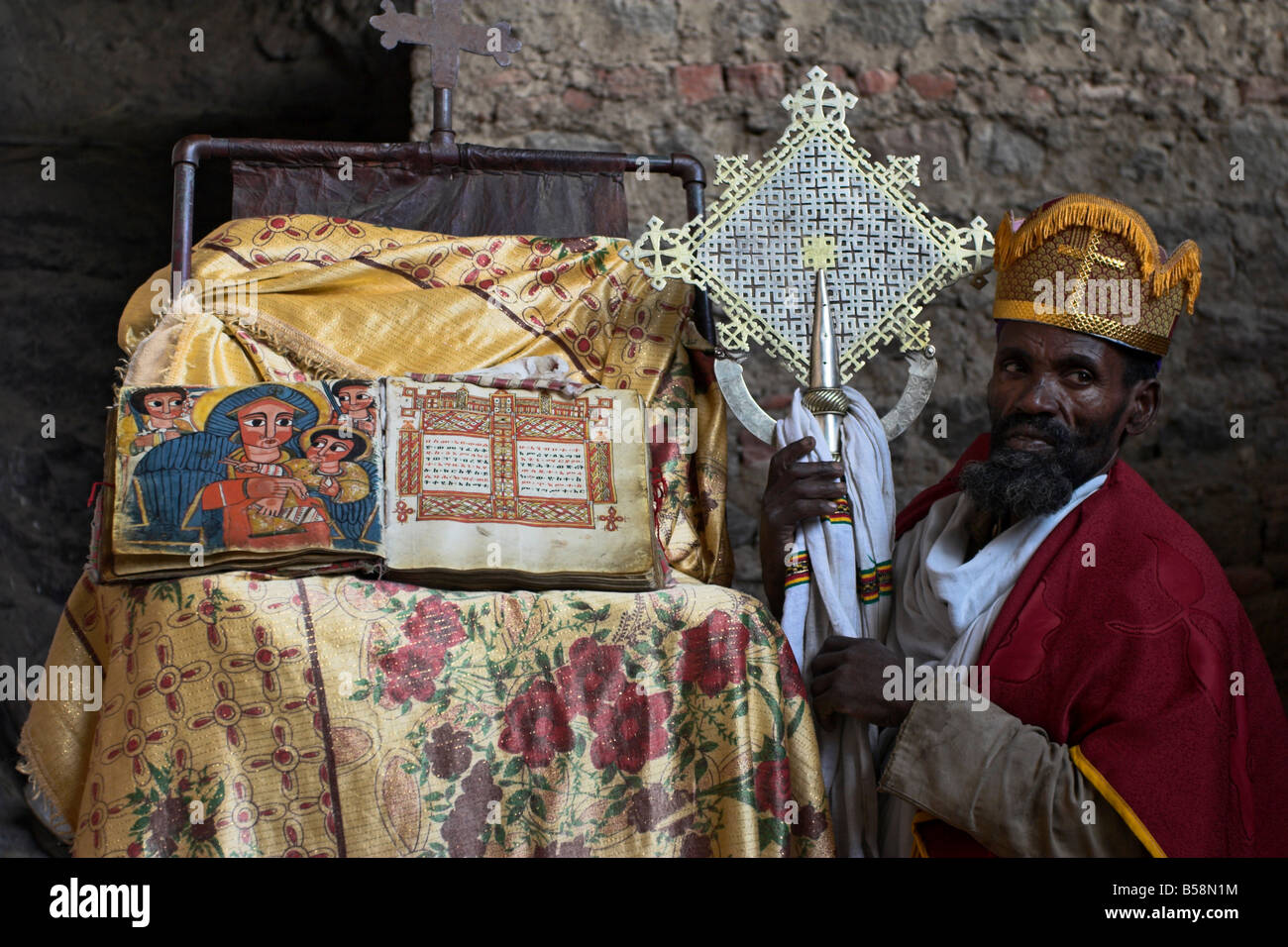 Na'akuto La'ab, priest with cross next to ancient chronicle thought to ...