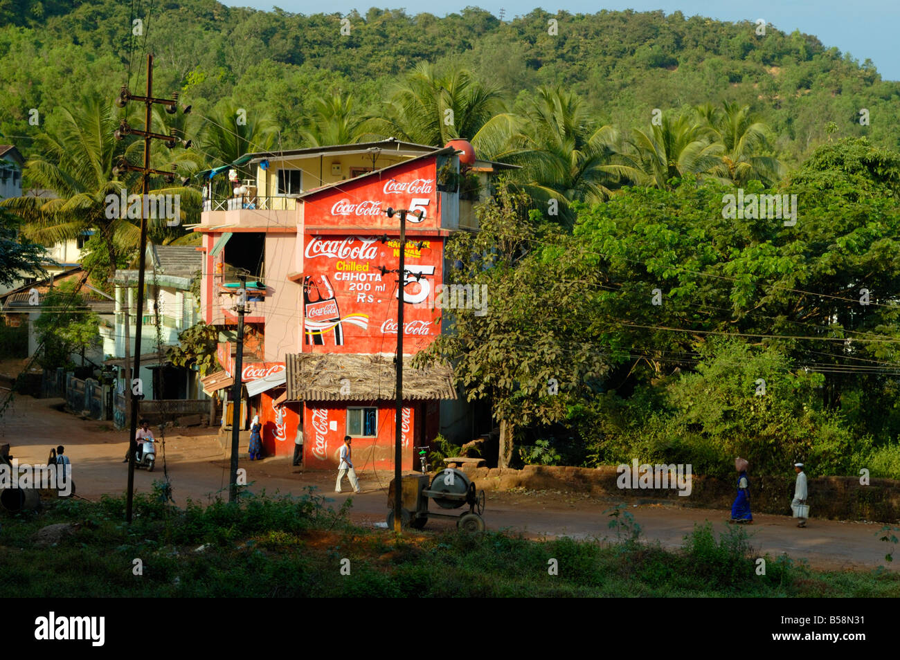Colourful Coca Cola wall advertising in the small village of Ponda ...