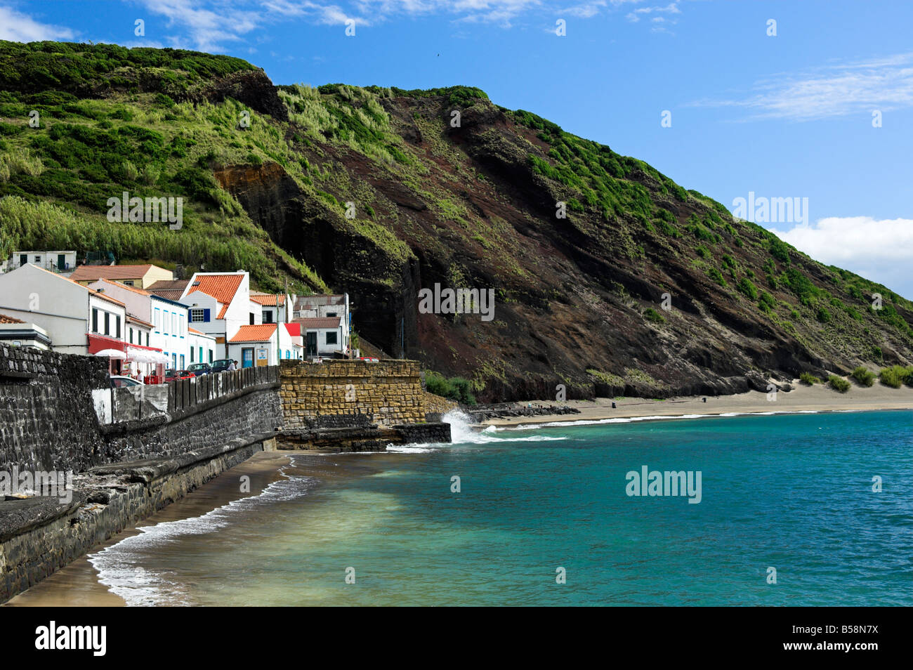 Porto Pim bay with houses beach and volcanic hill Horta on Faial Island ...