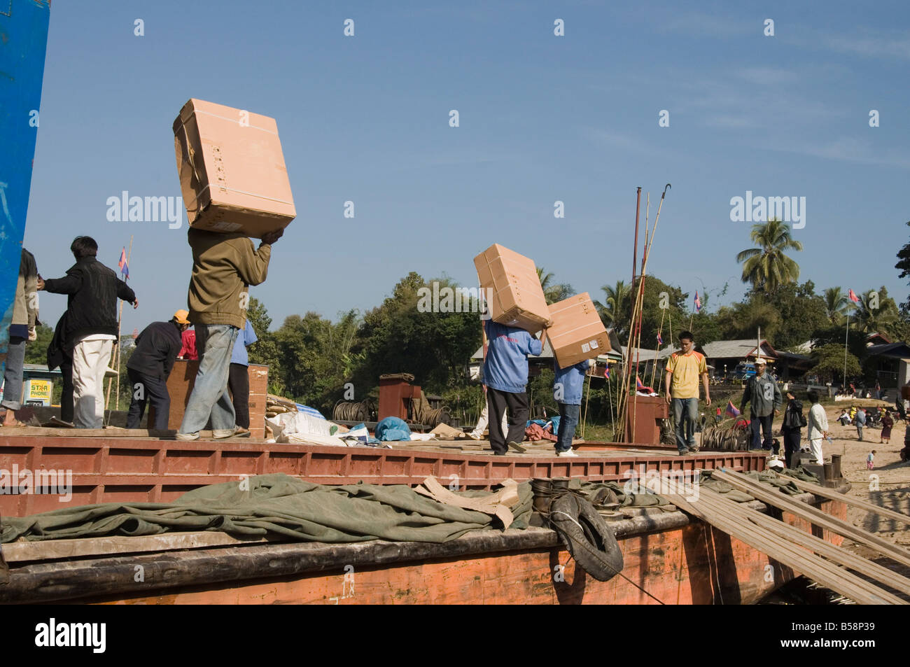 People unloading hi-res stock photography and images - Alamy