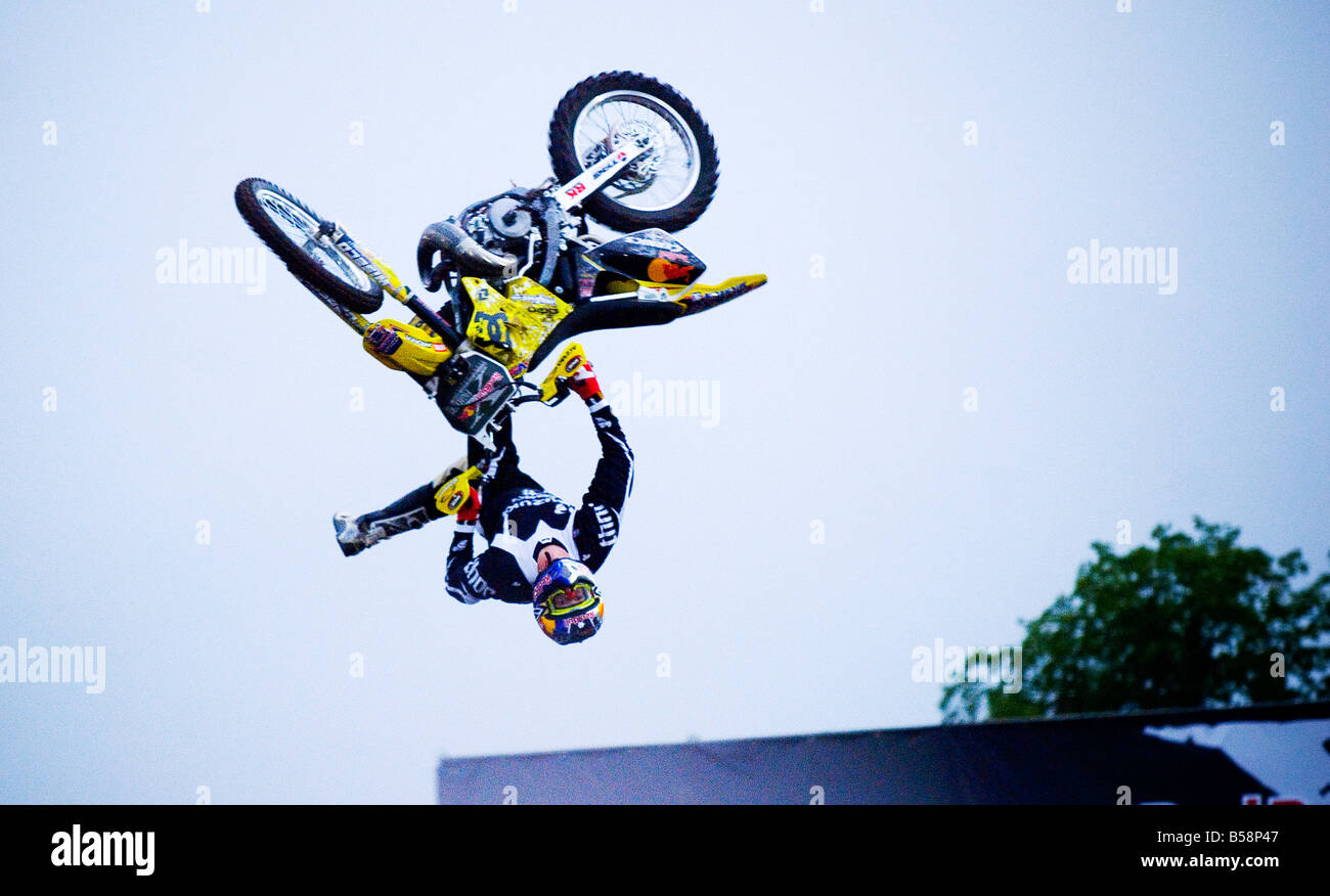 A motocross motorcyclist performing stunts Stock Photo - Alamy
