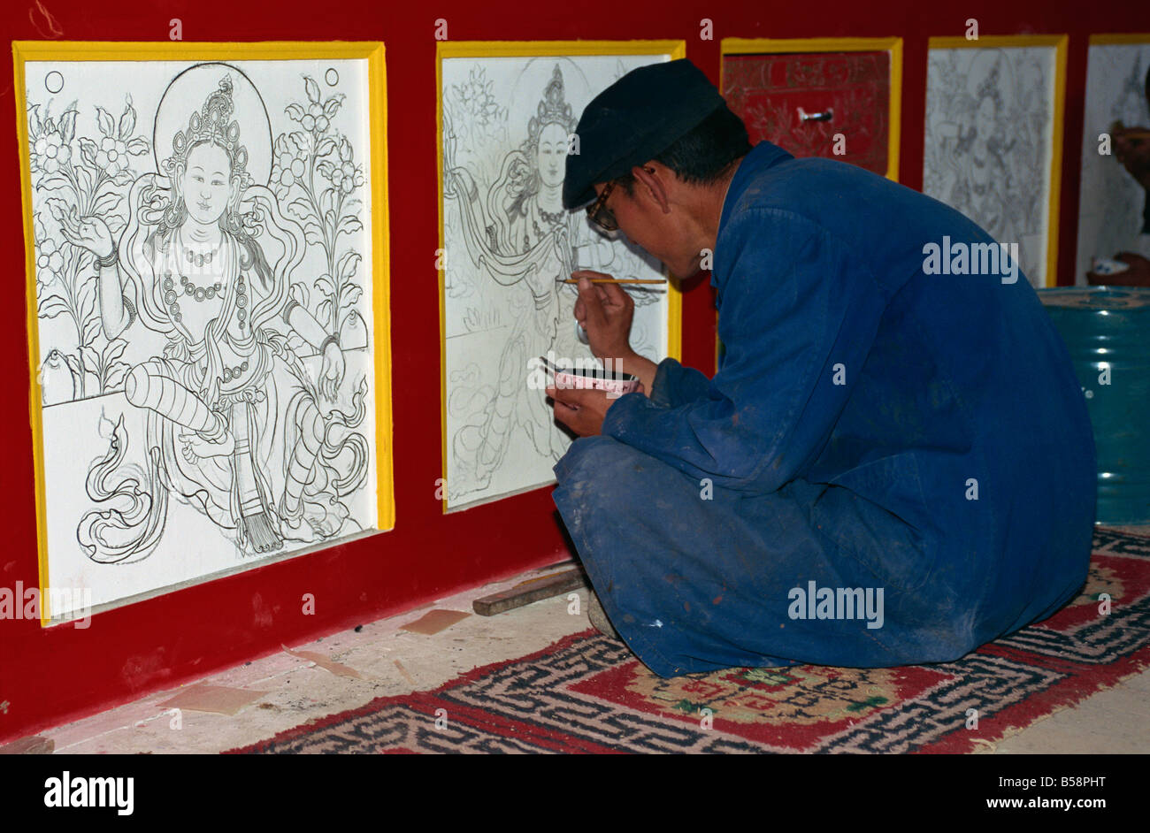 Rebuilding Regong artist Long Wu Monastery Tongren Qinghai China Asia ...