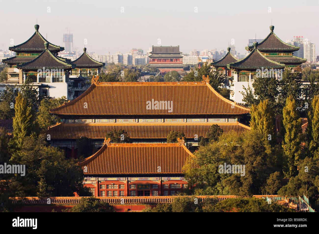 Temple buildings in Jingshan Park looking down to the Drum tower in the ...