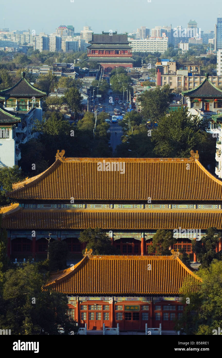Temple buildings in Jingshan Park looking down to the Drum tower in the ...