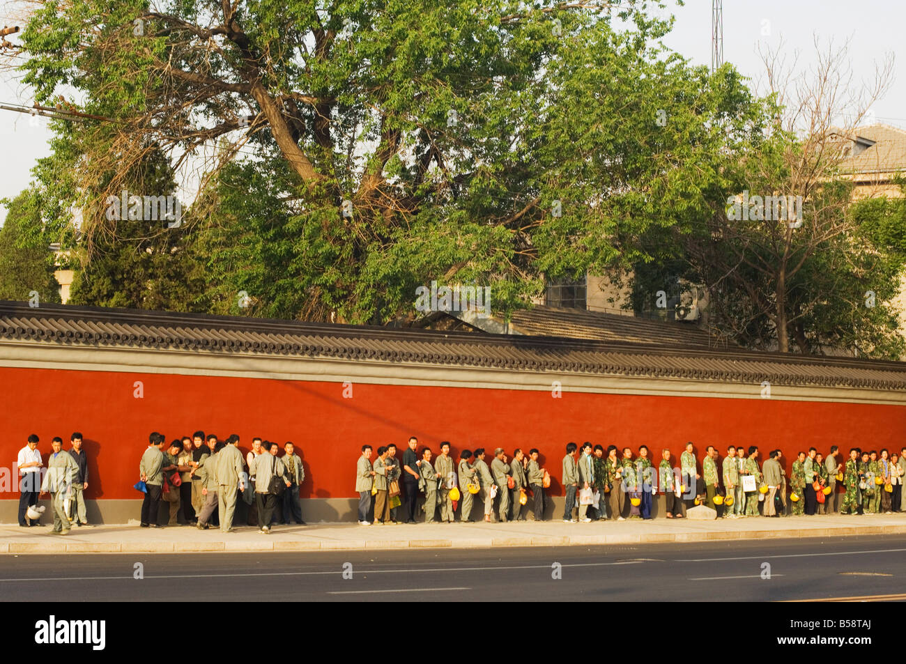 Line of workers waiting to start work in the early morning, Beijing ...