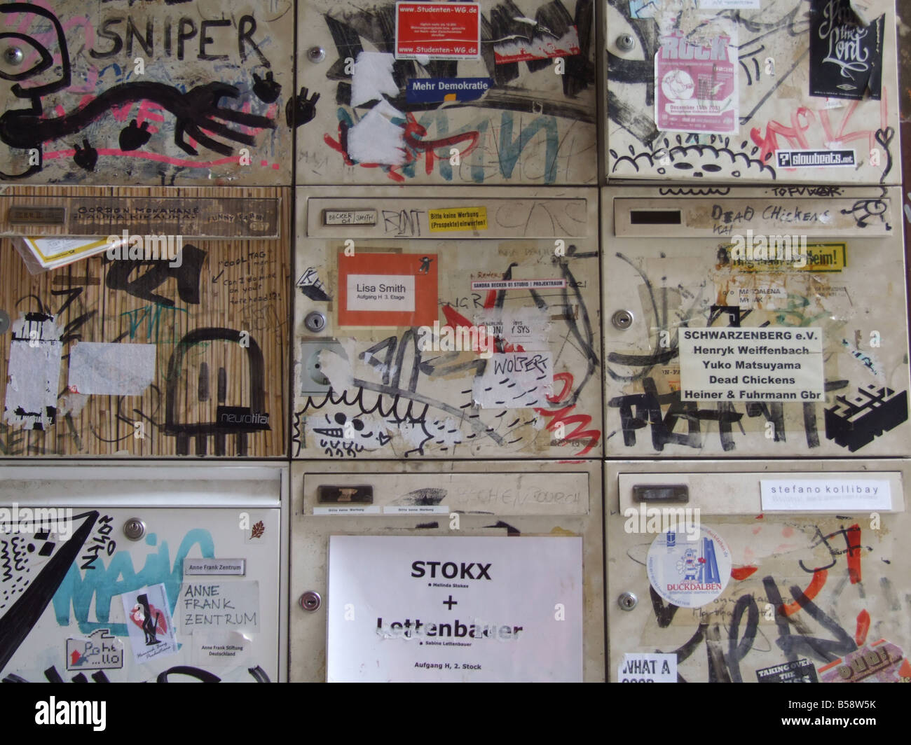 mail boxes covered with graffiti in berlin germany Stock Photo - Alamy