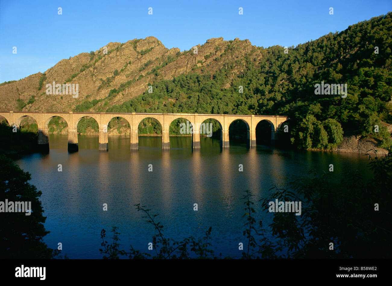 Lac de Villefort and railway viaduct Cevennes Lozere Languedoc ...