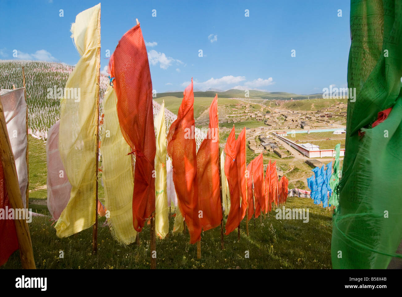 Prayer flags on hillside, Tagong Grasslands, Sichuan, China Stock Photo ...