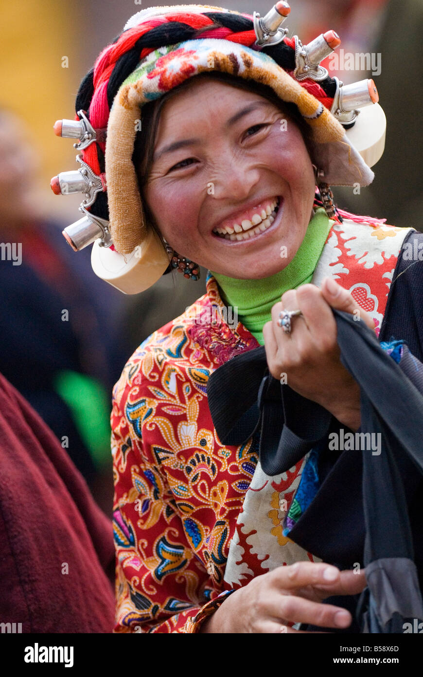 Young woman in ethnic dress, Jingang temple, Kangding, Sichuan, China ...