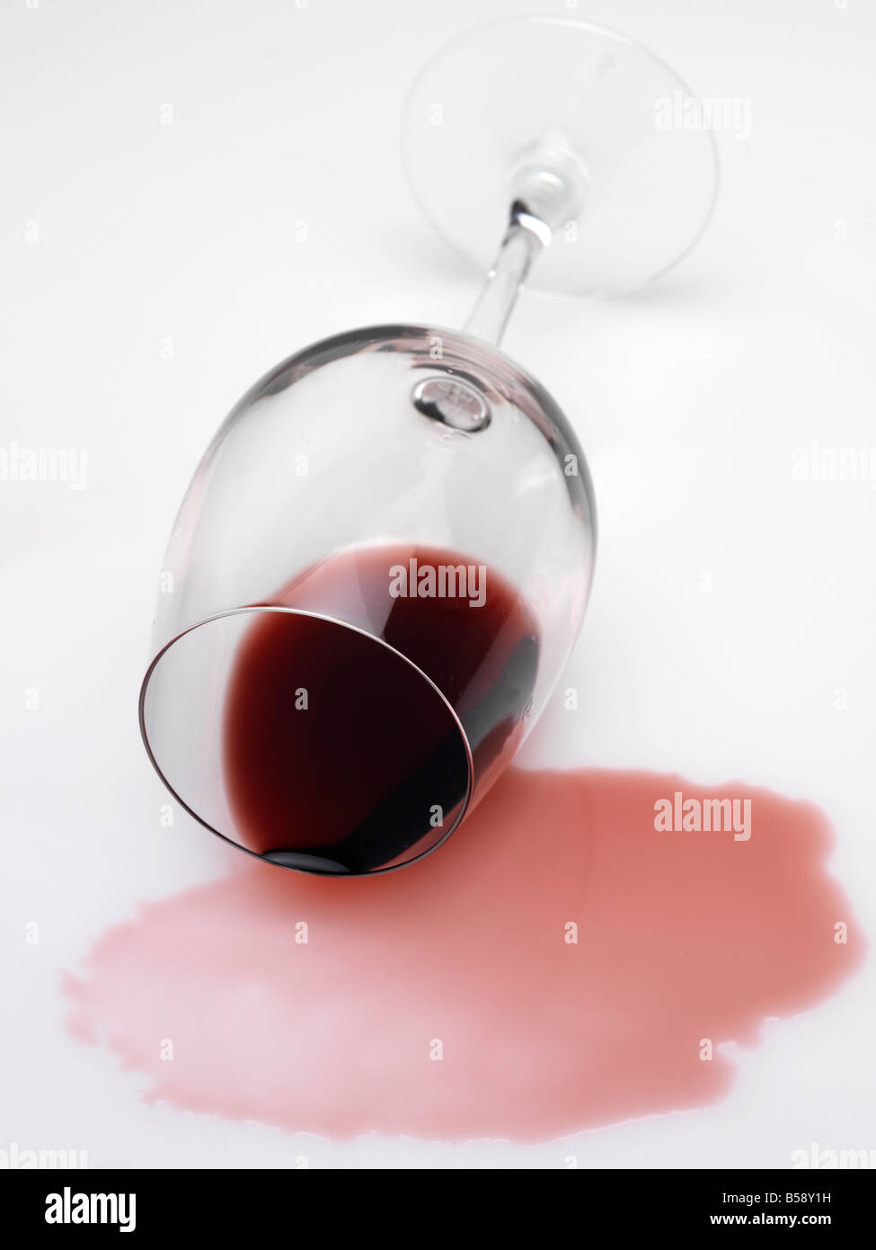 Spilt glass of red wine Stock Photo - Alamy