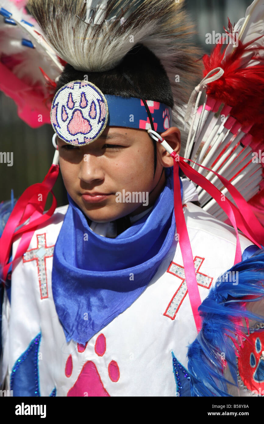 A teenager Native American Indian boy dancer at a Pow Wow at the ...