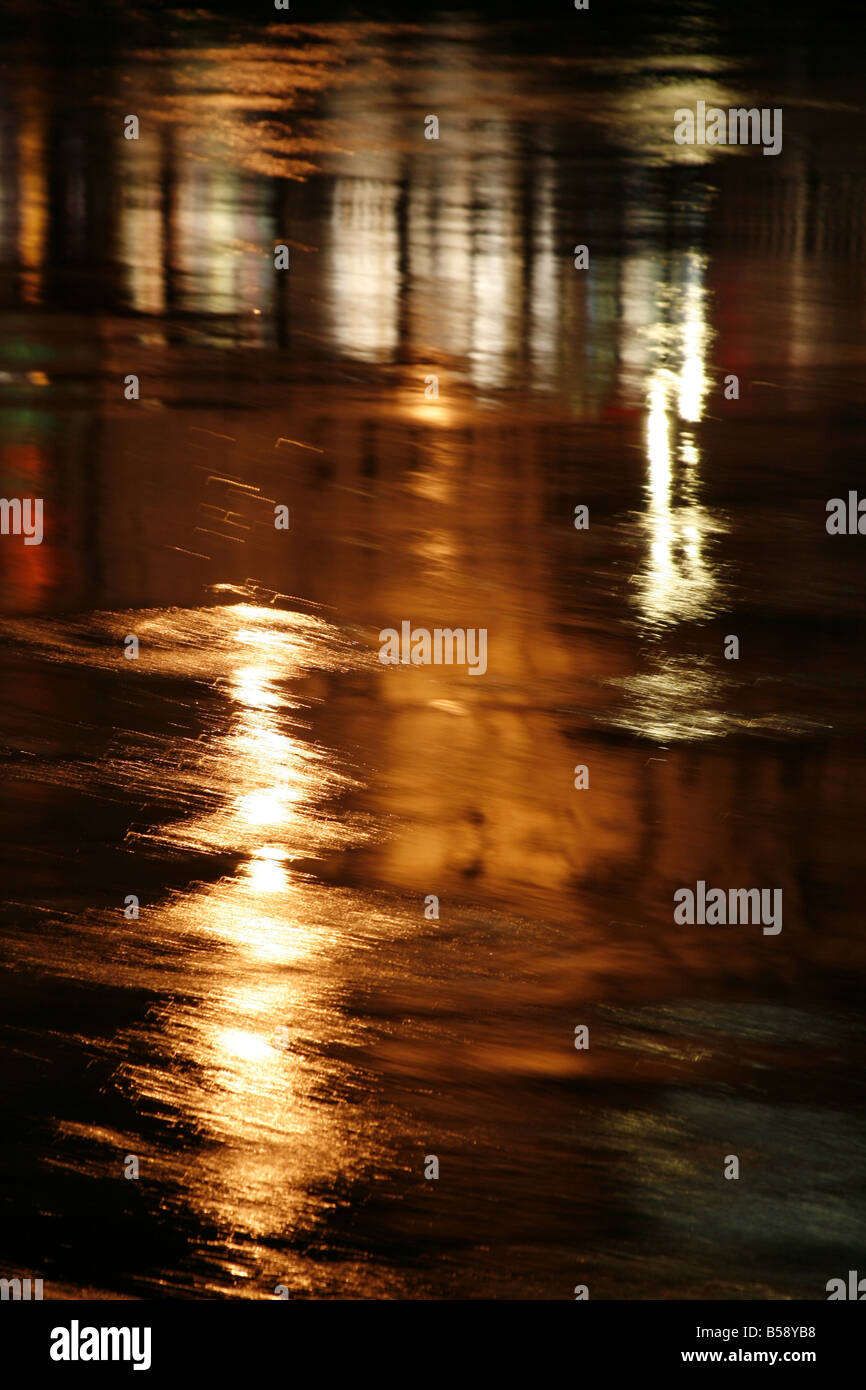 urban city town lights reflection in water night Stock Photo - Alamy