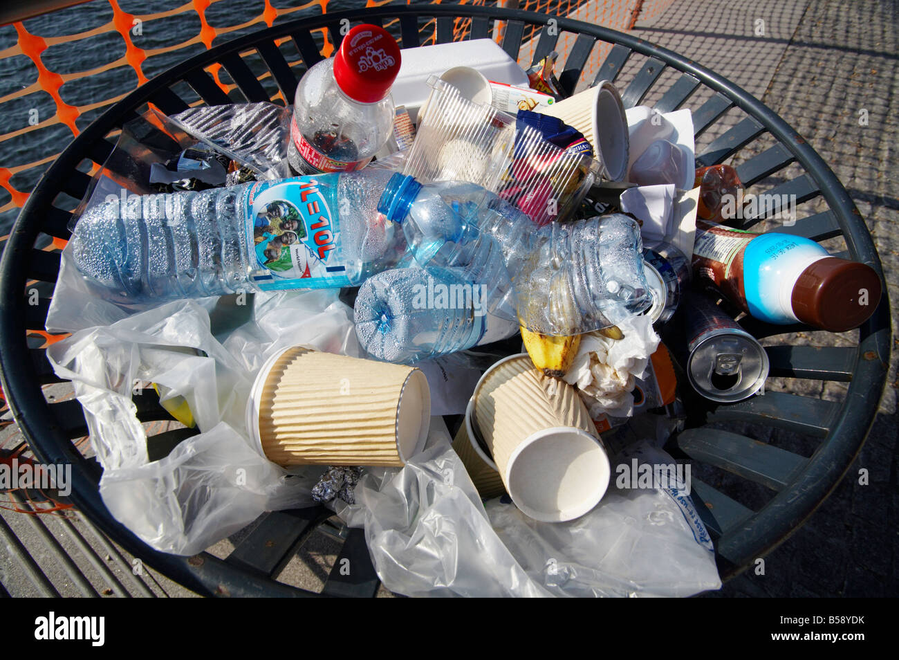 overfilled rubbish or trash bin Stock Photo - Alamy