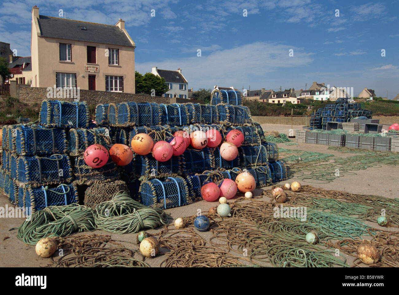Nets stacked up at harbour side Molene Island Bretagne France G ...