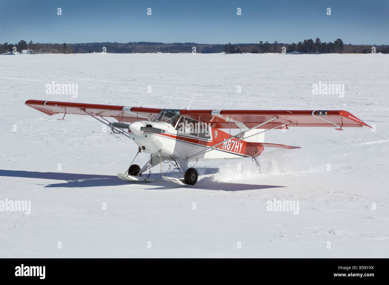 Airplane in winter sky hi-res stock photography and images - Alamy
