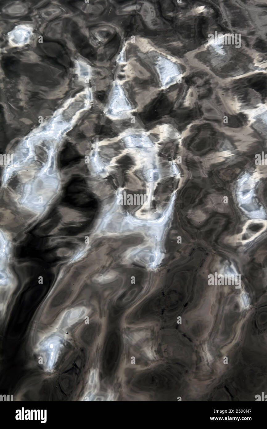 sun light reflection waves on lake water surface Stock Photo - Alamy