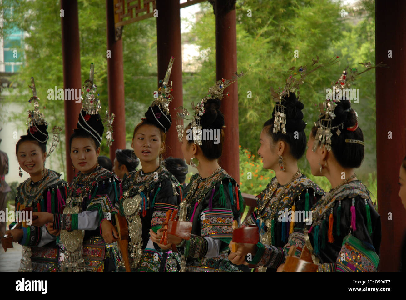 Women prepare to perform traditional music. They are members of the ...