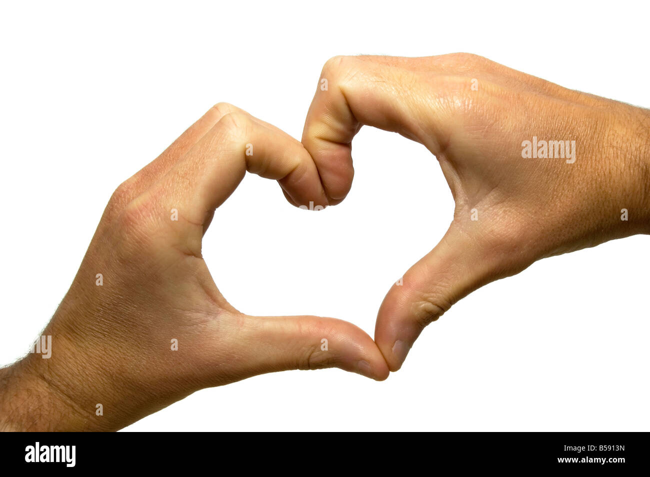 Hands forming the shape of a heart Isolated on white so the heart can ...