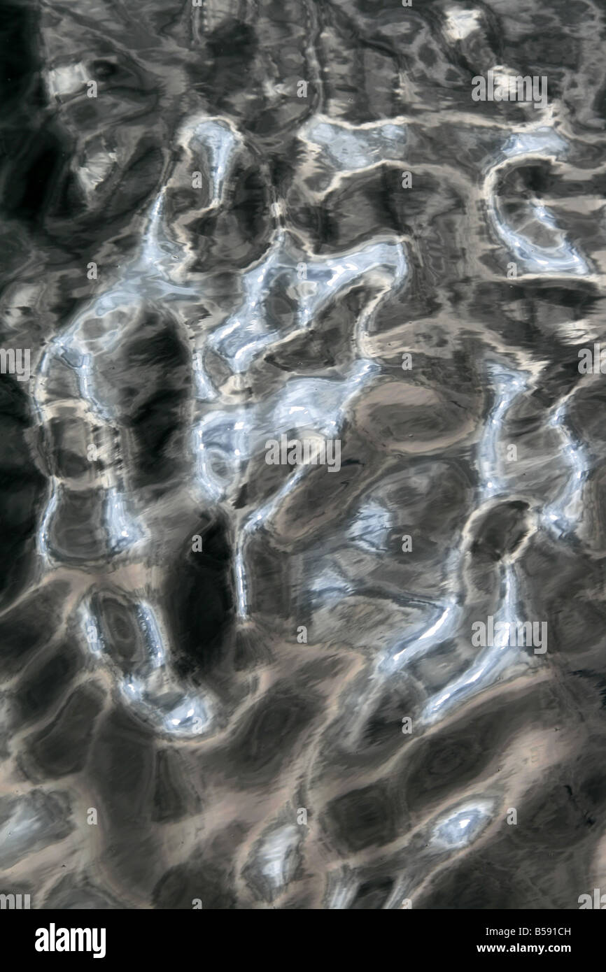 sun light reflection waves on lake water surface Stock Photo - Alamy