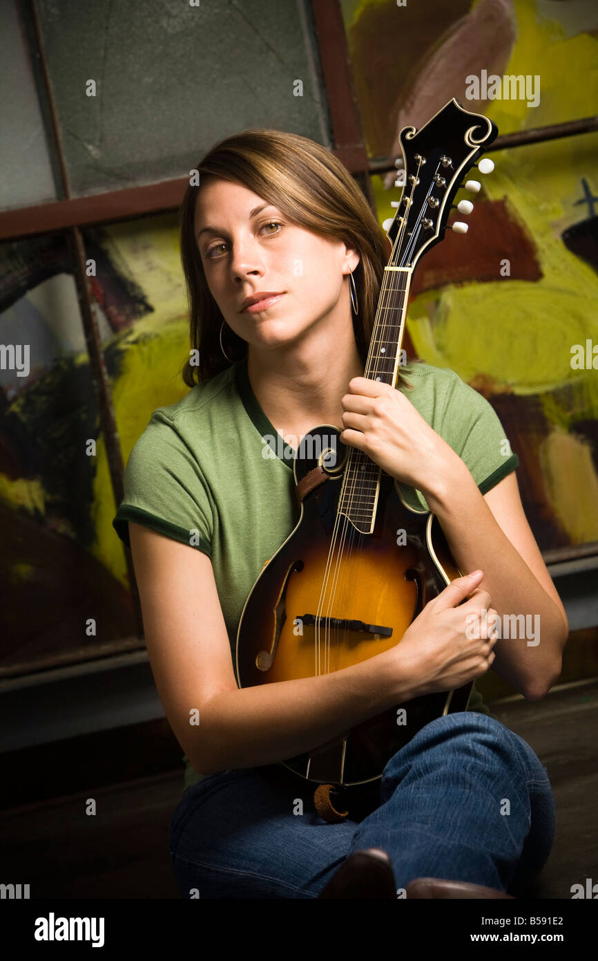 Woman with a mandolin Stock Photo - Alamy