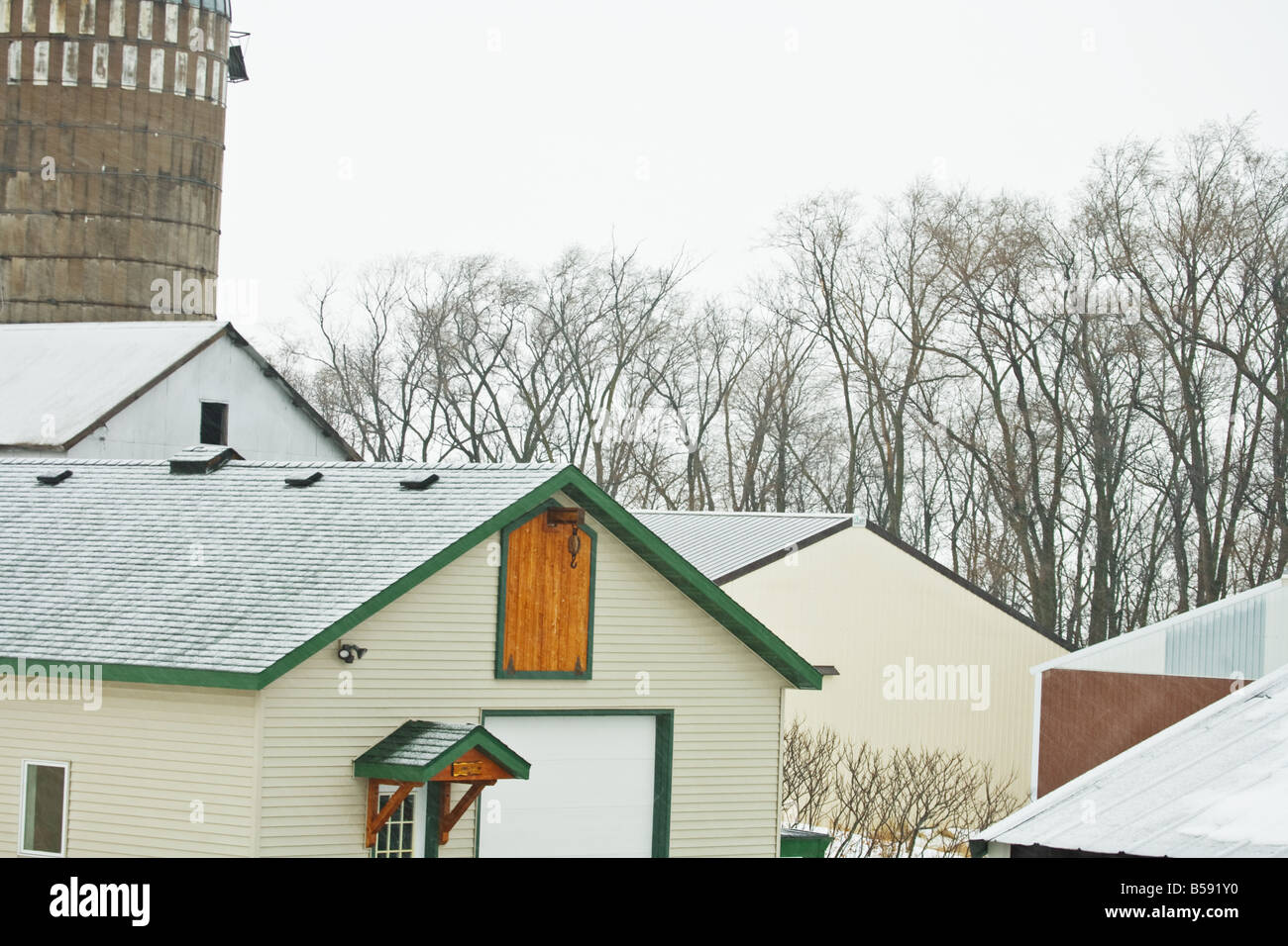 An overview of multiple building roofs on a farm Stock Photo - Alamy