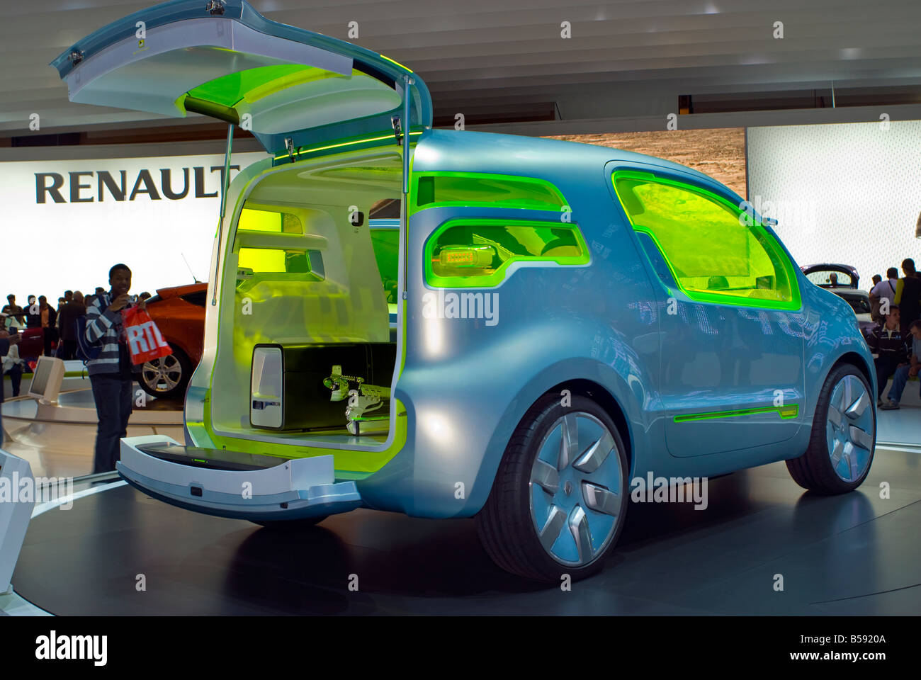 Paris France, man looking low carbon cars Trade Show, Electric Motor ...