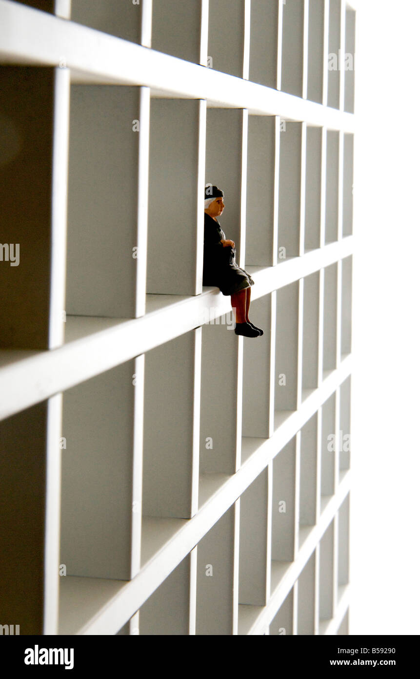 Unique perspective of a small figure sitting in a large grid structure ...