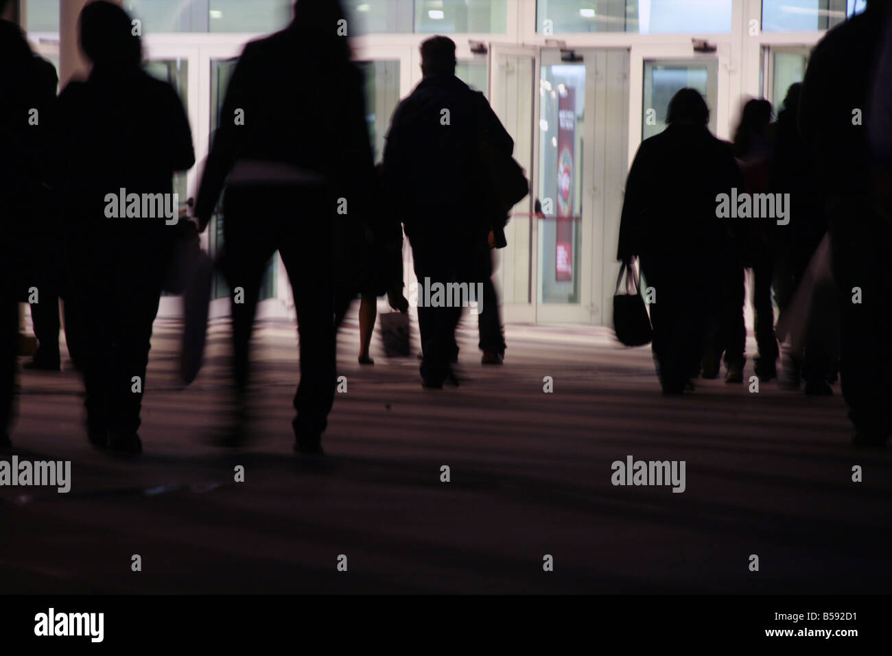 crowd of people walking in street at night Stock Photo - Alamy