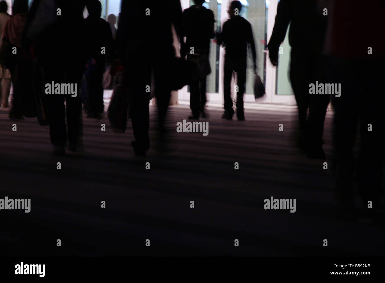 crowd of people walking in street at night Stock Photo - Alamy