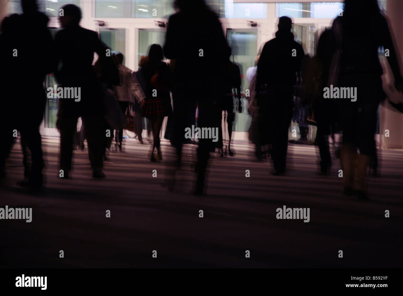 crowd of people walking in street at night Stock Photo - Alamy