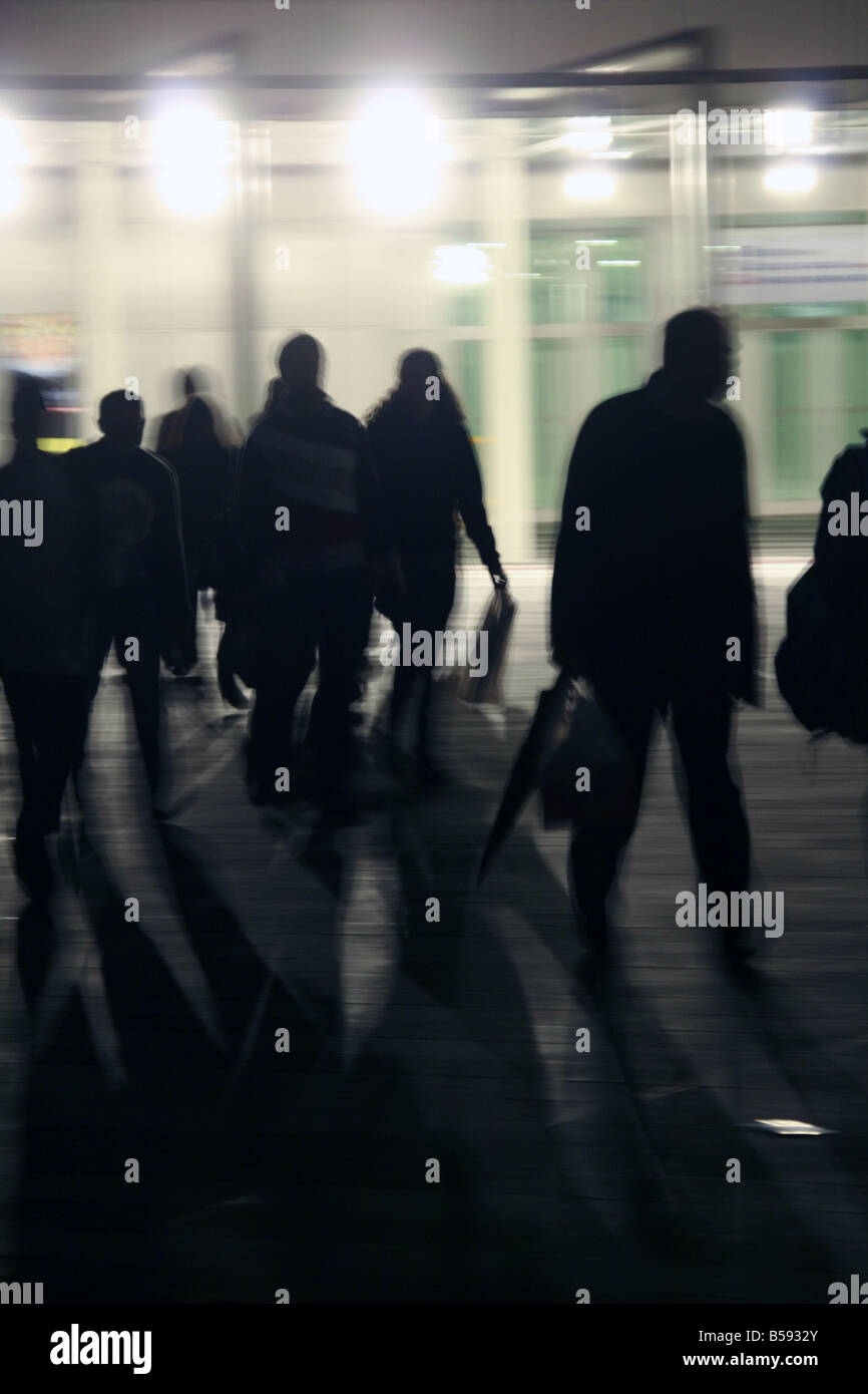 crowd of people walking in street at night Stock Photo - Alamy