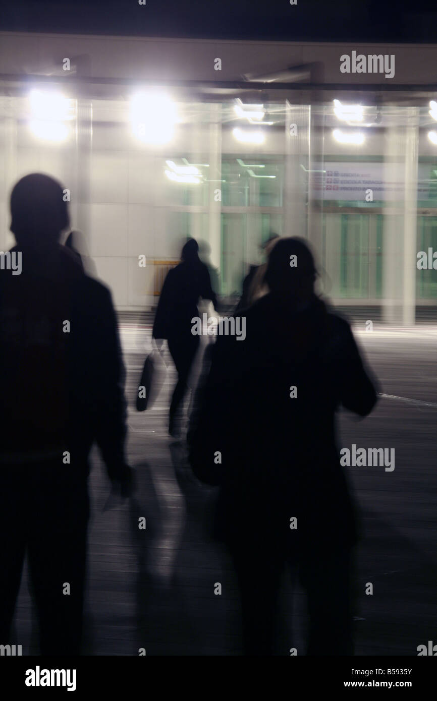 crowd of people walking in street at night Stock Photo - Alamy