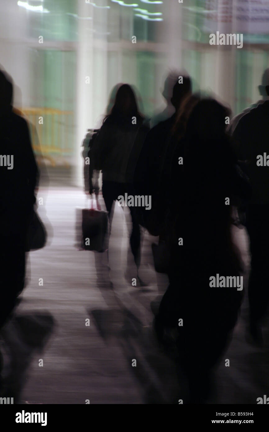 crowd of people walking in street at night Stock Photo - Alamy